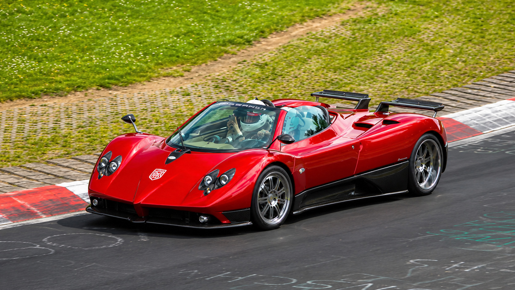 Million-dollar hypercar running at high speed on the Nürburgring track