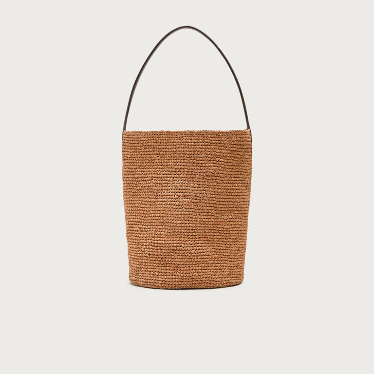 Fact: This French-girl bag trend makes black trousers and loafers look ...