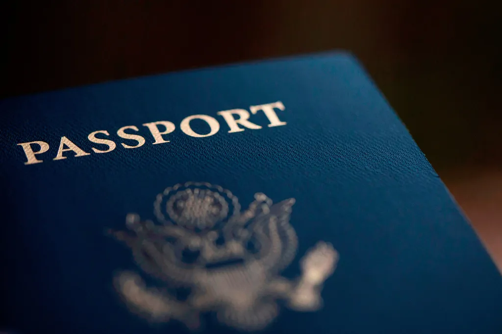 Trump reveals new passport design featuring his portrait with warning