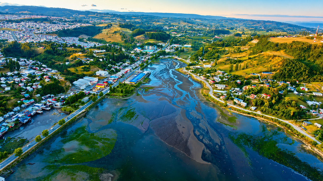 A coastal town wrapped in winding tidal waterways