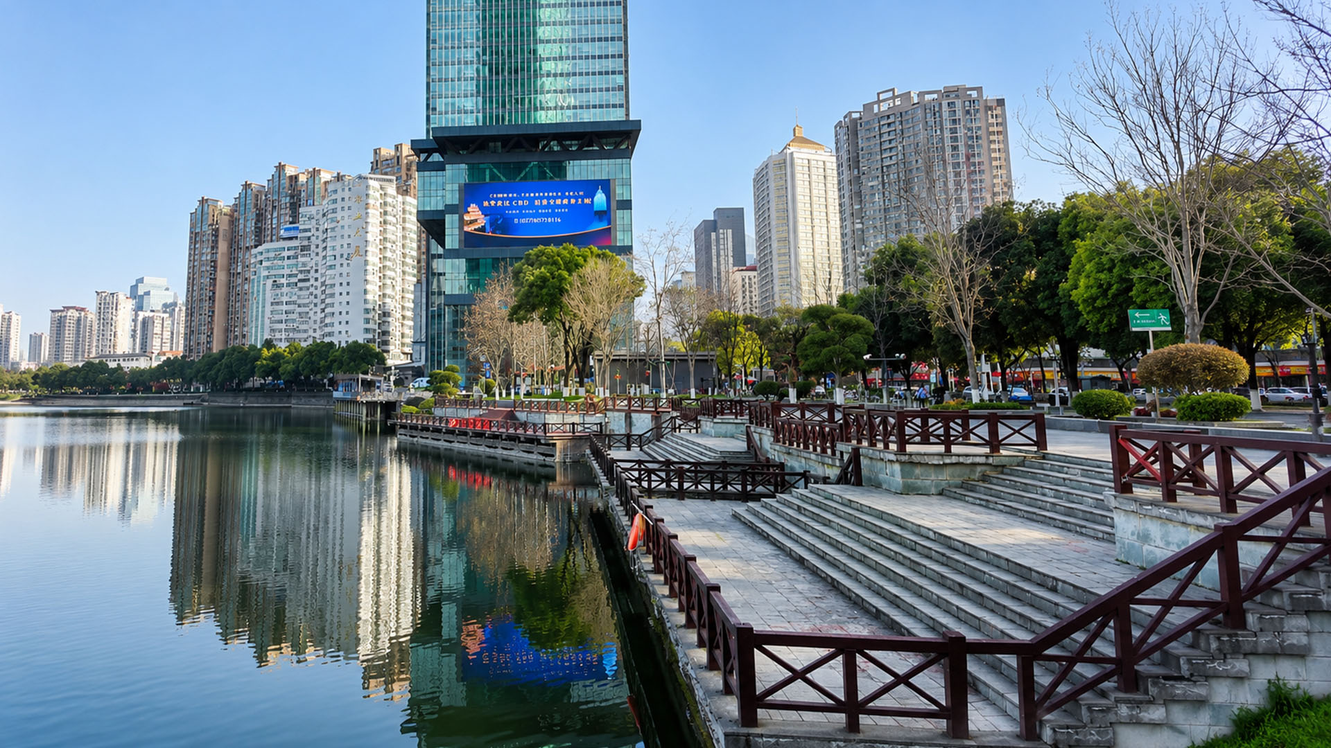 A hidden waterfront promenade frames a beautiful modern skyline