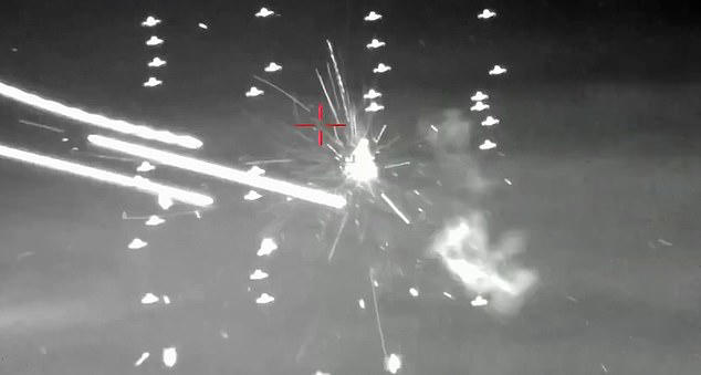 Astonishing moment South Korea blasts drone swarm out of the sky in ...