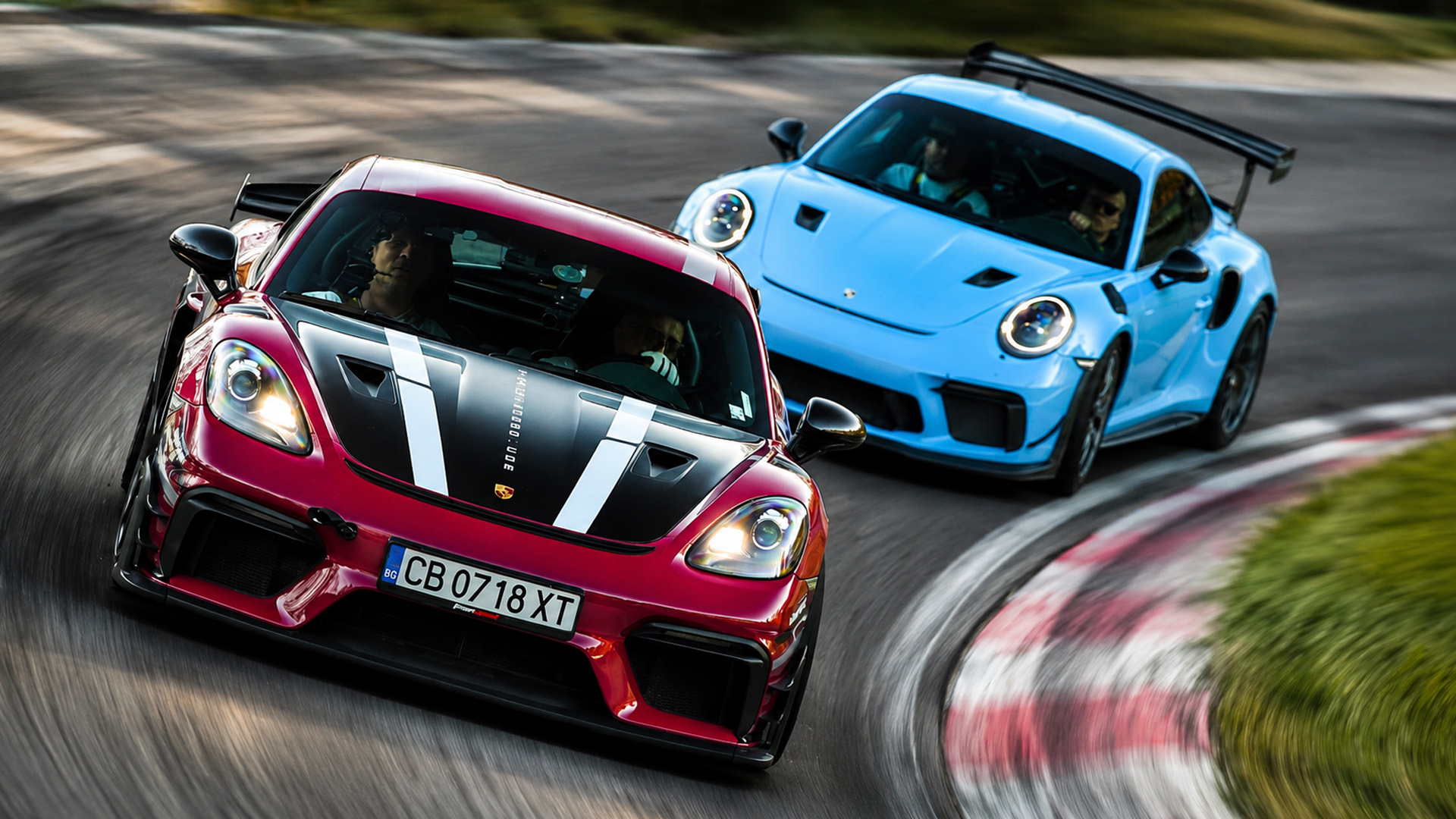 Two Porsche track monsters push hard through corner