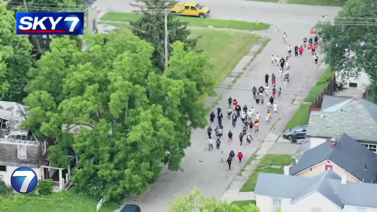 Hundreds spread awareness about gun violence during neighborhood walk ...