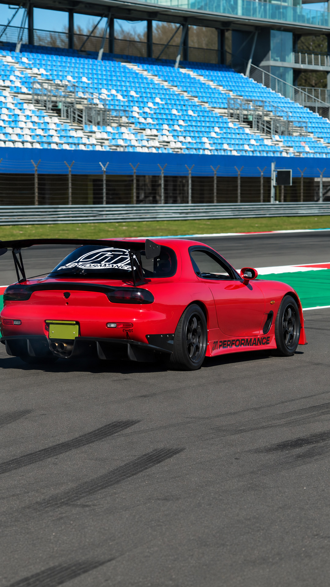 Mazda RX-7 screams through a wild track run