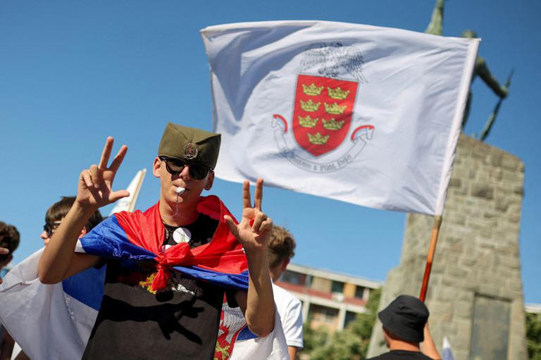 Serbians to keep up protest after President Vucic says he will step down