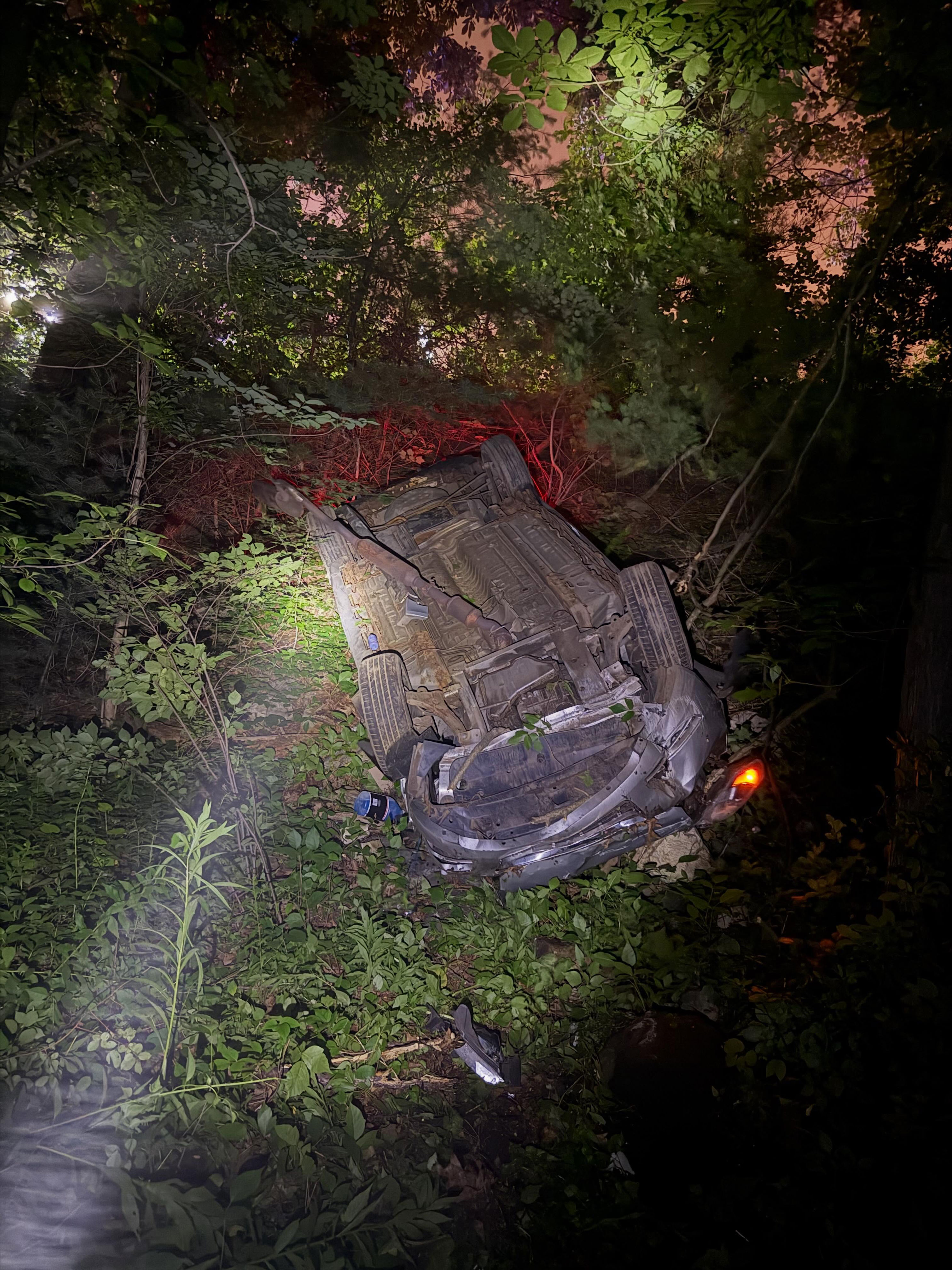 Driver 'miraculously' unhurt after car plunges off Rte. 20 retaining wall