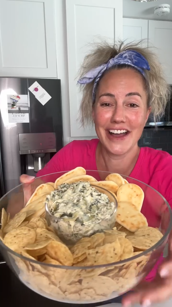 This easy crockpot spinach artichoke dip is always the first to disappear