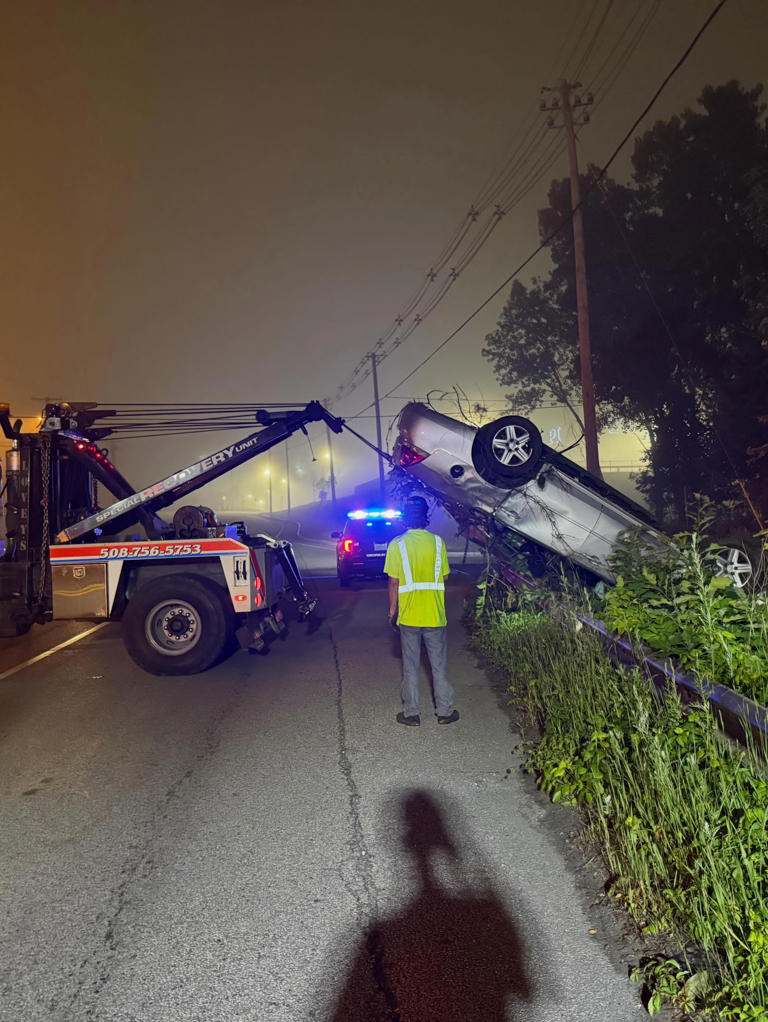 Driver 'miraculously' unhurt after car plunges off Rte. 20 retaining wall