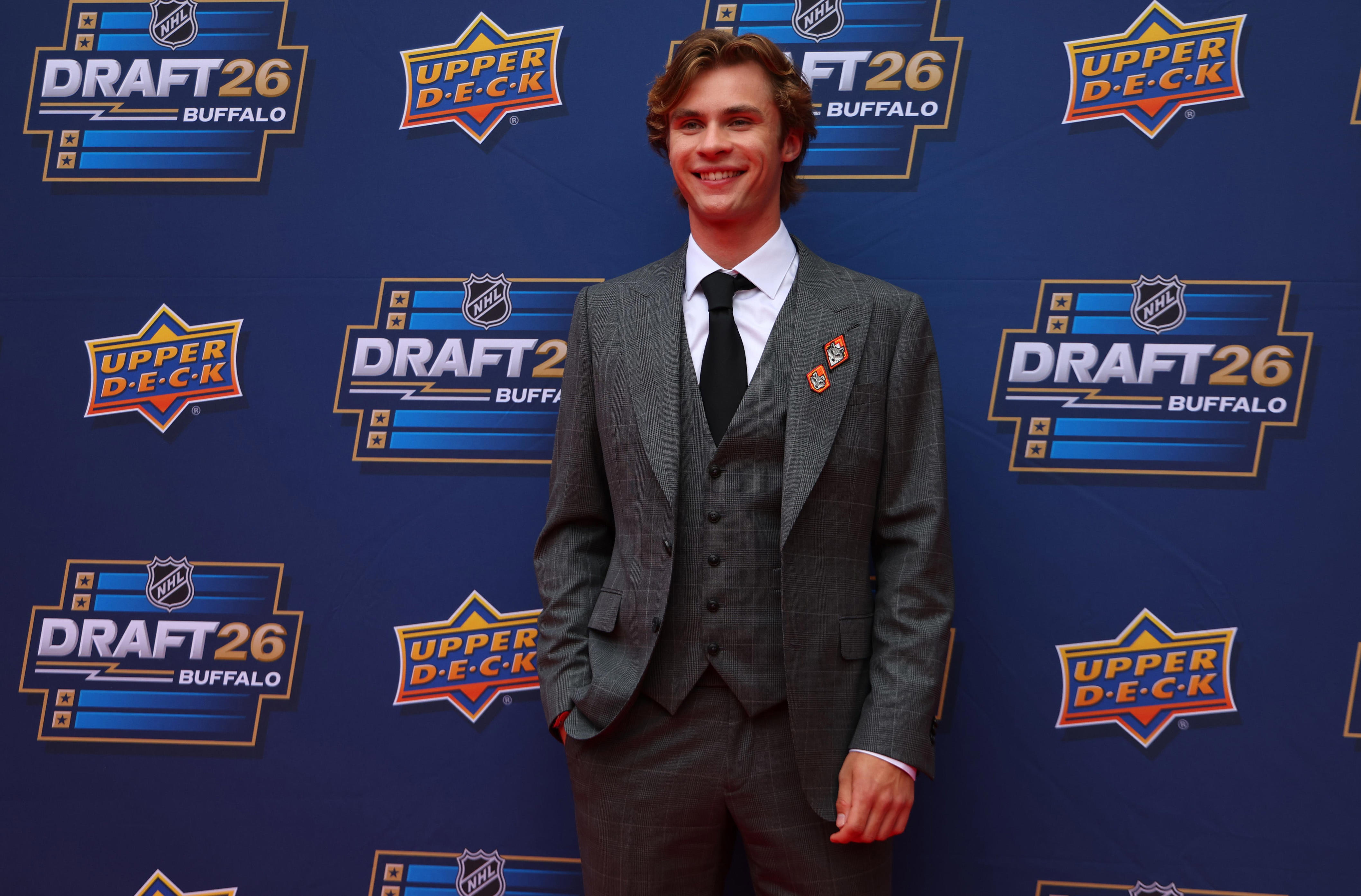 Auston Matthews congratulates Penn State's Gavin McKenna on draft night