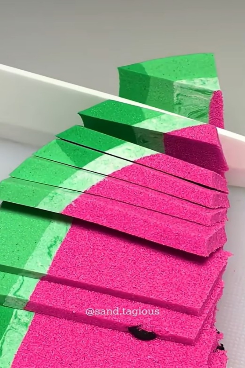 Sliced pink and green foam block sand art