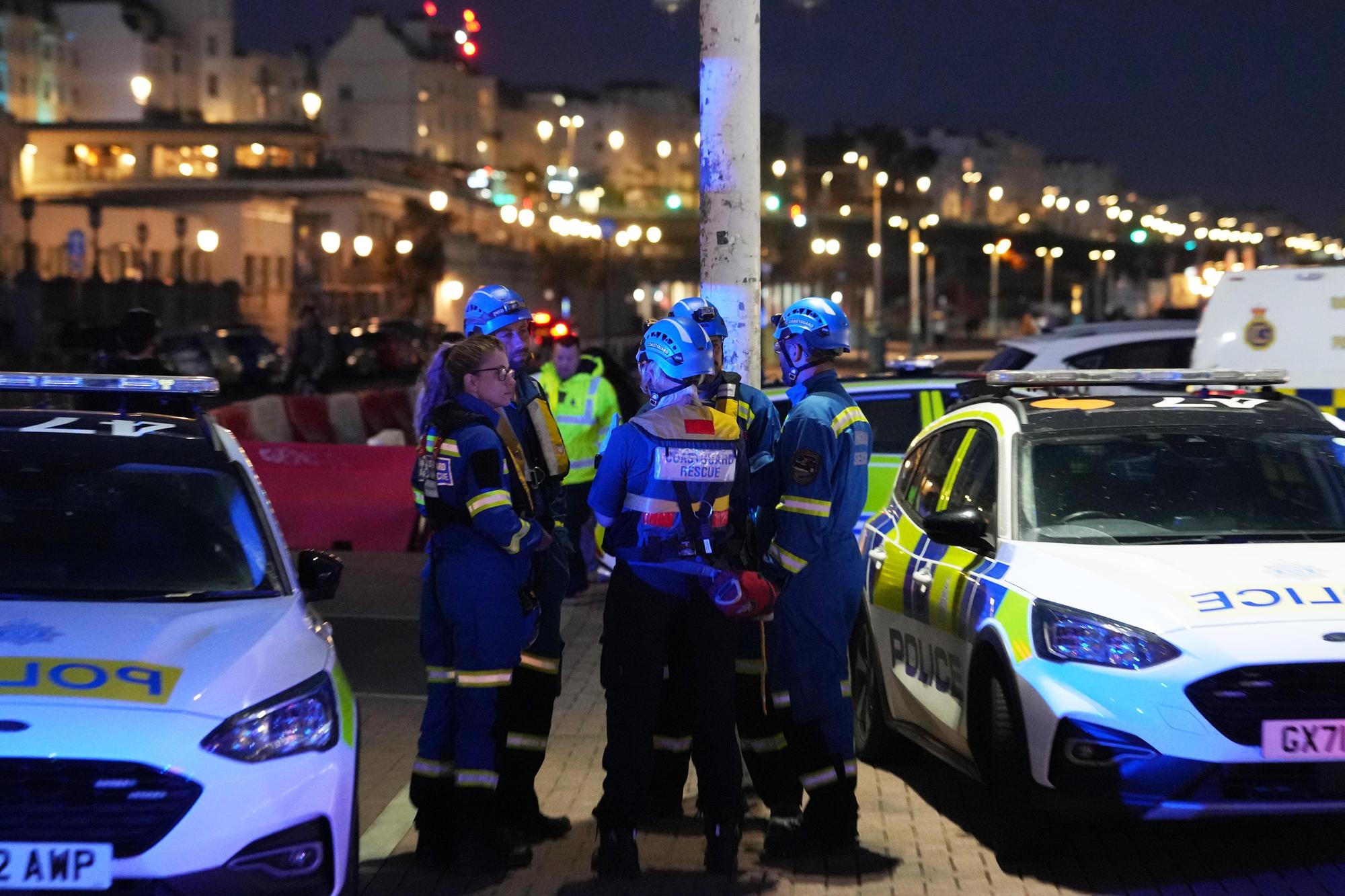 Photos show emergency response at Sussex pier as two rescued from sea