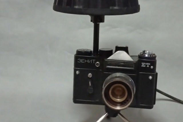Broken camera, lens, and tripod gathered dust for years until they came ...