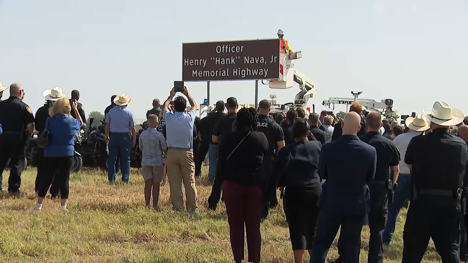 Henry 'Hank' Nava Jr. highway sign unveiled in front of fallen officer ...