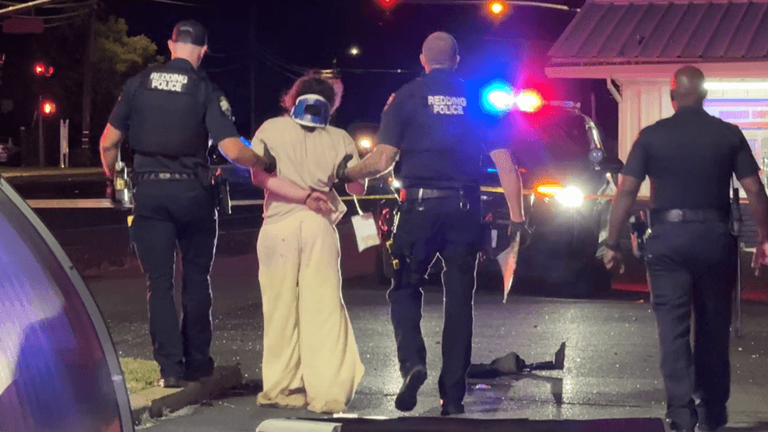 Driver arrested after crash sends vehicle into bus stop, injures four ...