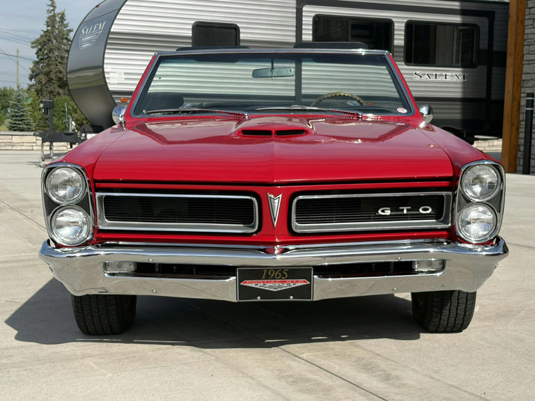 This 507-hp 1965 Pontiac GTO convertible is a 455-powered tri-power stunner