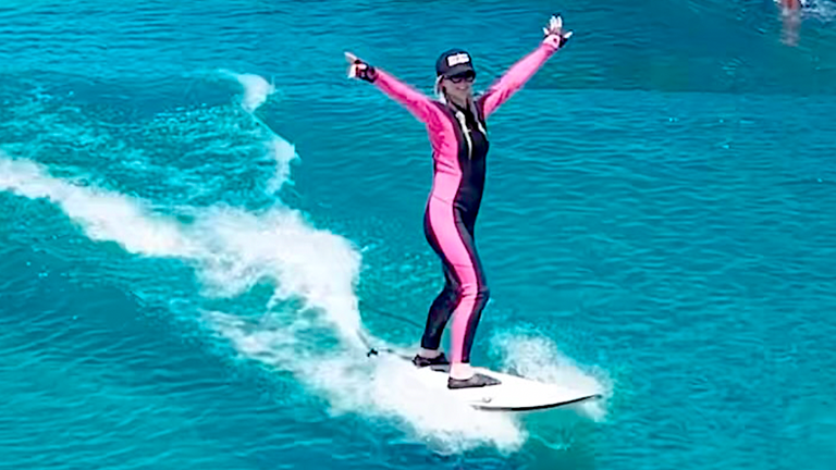 Watch Paris Hilton surf Kelly Slater’s world-famous wave pool (video)