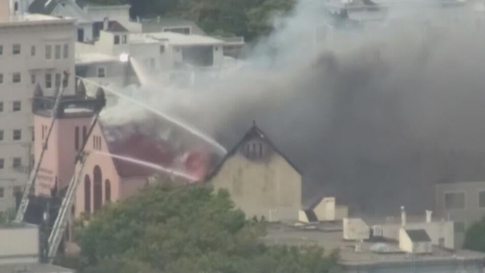 Firefighters work against flames as Seventh Day Adventist Church ...