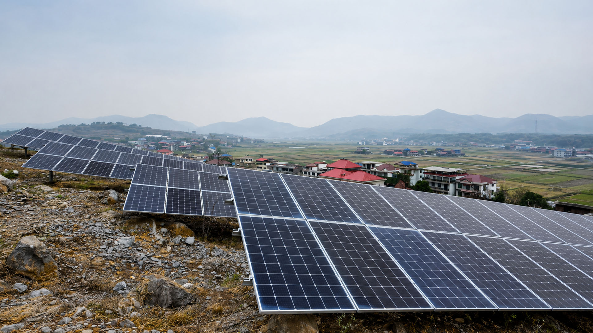 A hillside solar farm reveals clean energy above the countryside