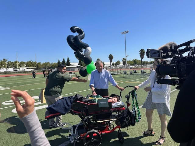 Inspiring student graduates high school while using telepresence robot