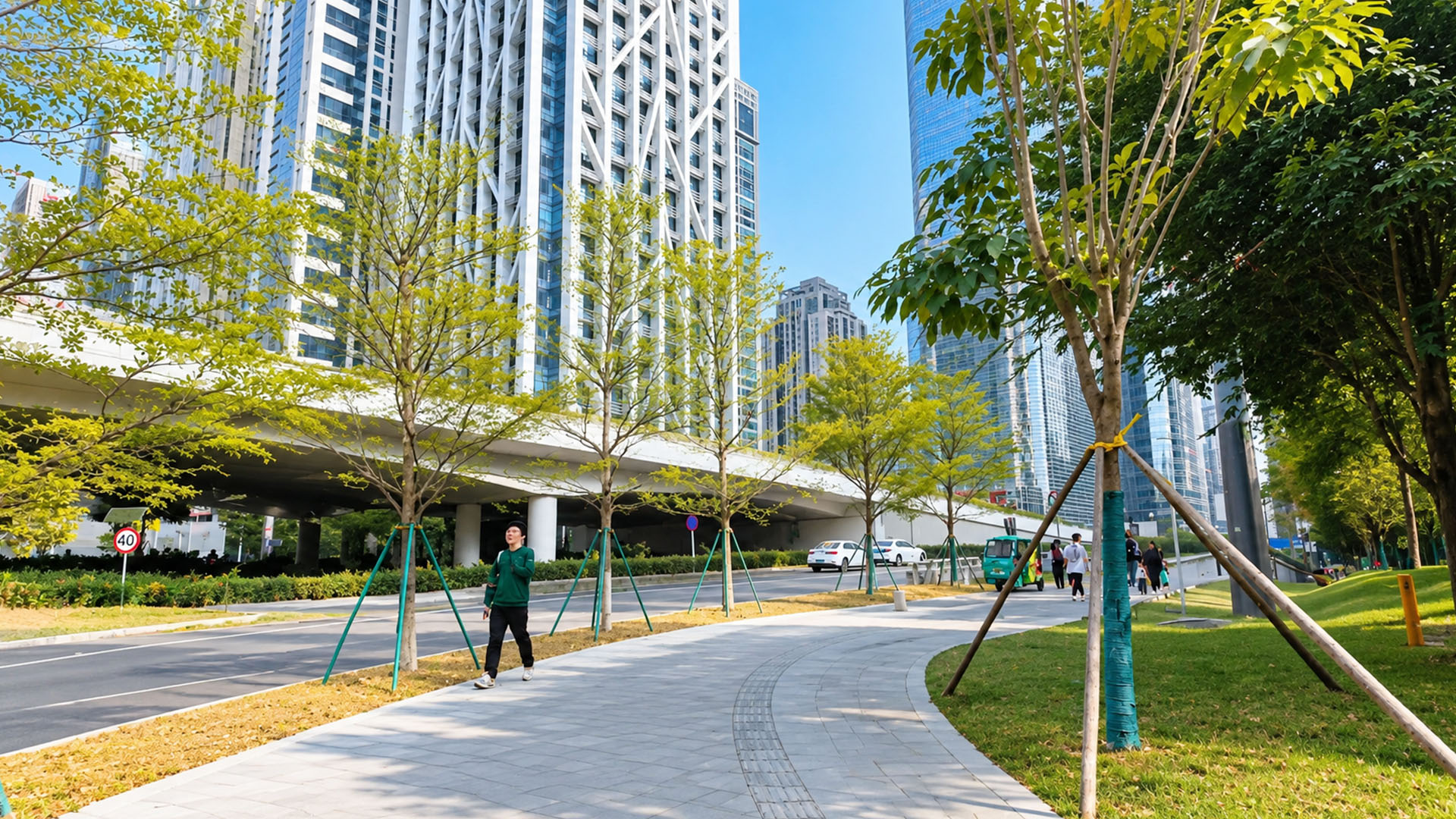 Inside a bright business district where nature softens the skyline