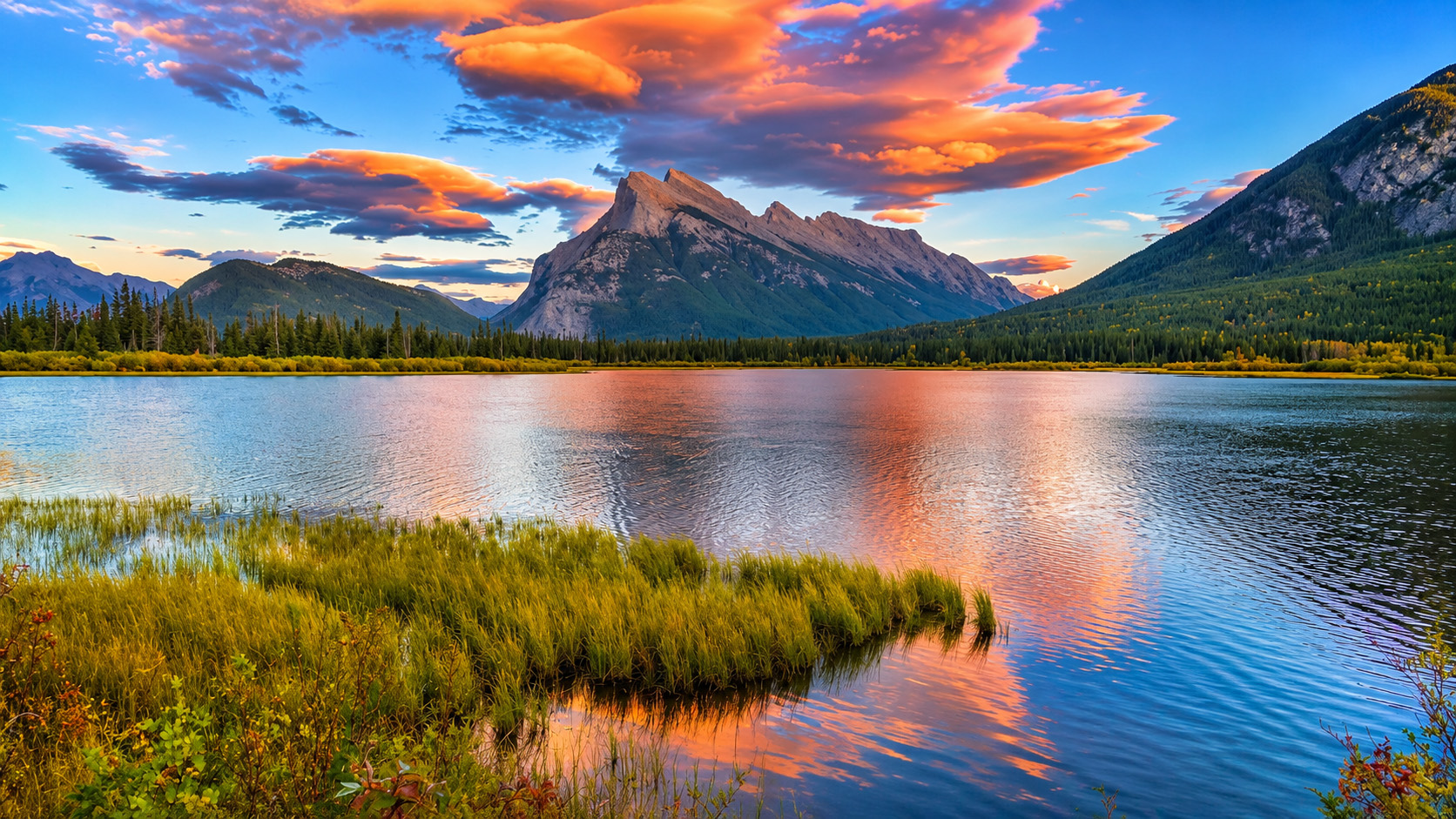 Banff’s mirror like lakes beneath Mount Rundle