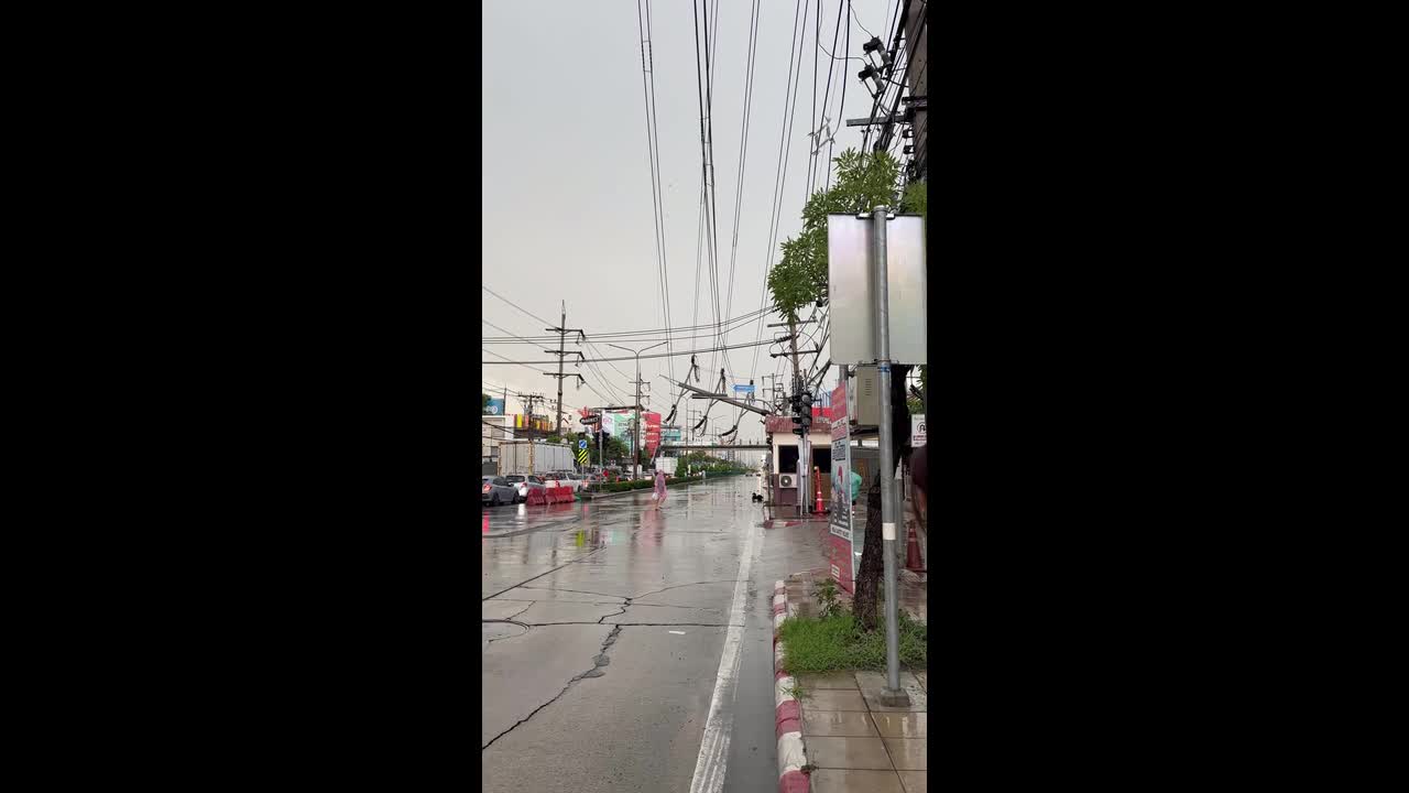 Roads flooded and power line collapsed during storm in Thailand