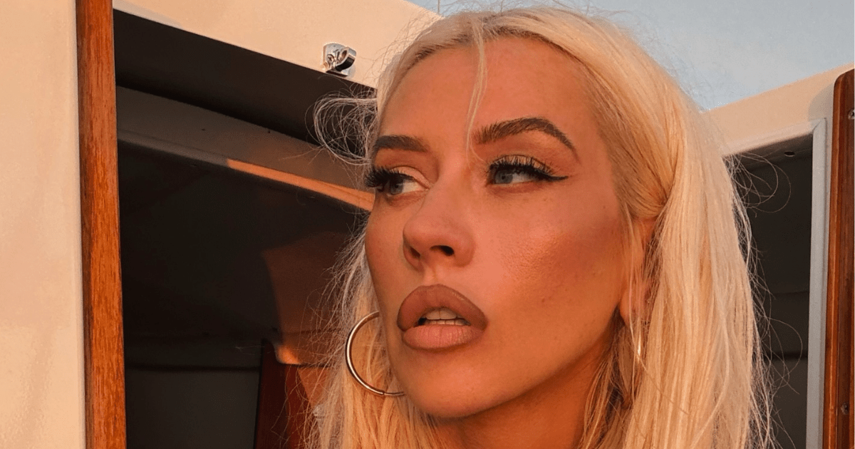 Christina Aguilera gives plain Khaite bodysuit a deep plunge for InStyle