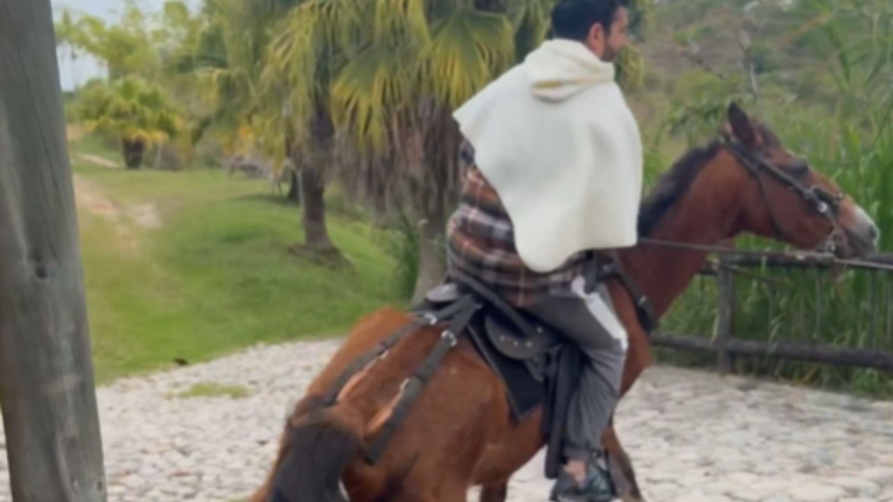 Rider takes a fall after horse slides