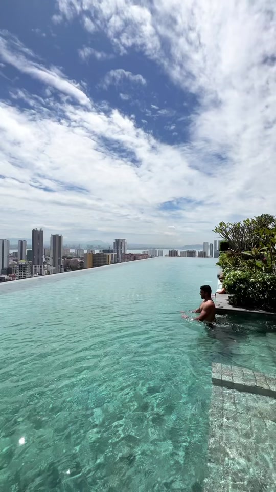 Swimming in a skyline infinity pool in Penang