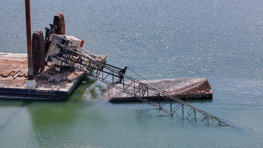 Drone footage captures crane toppled into waterway near Hilton Head Island