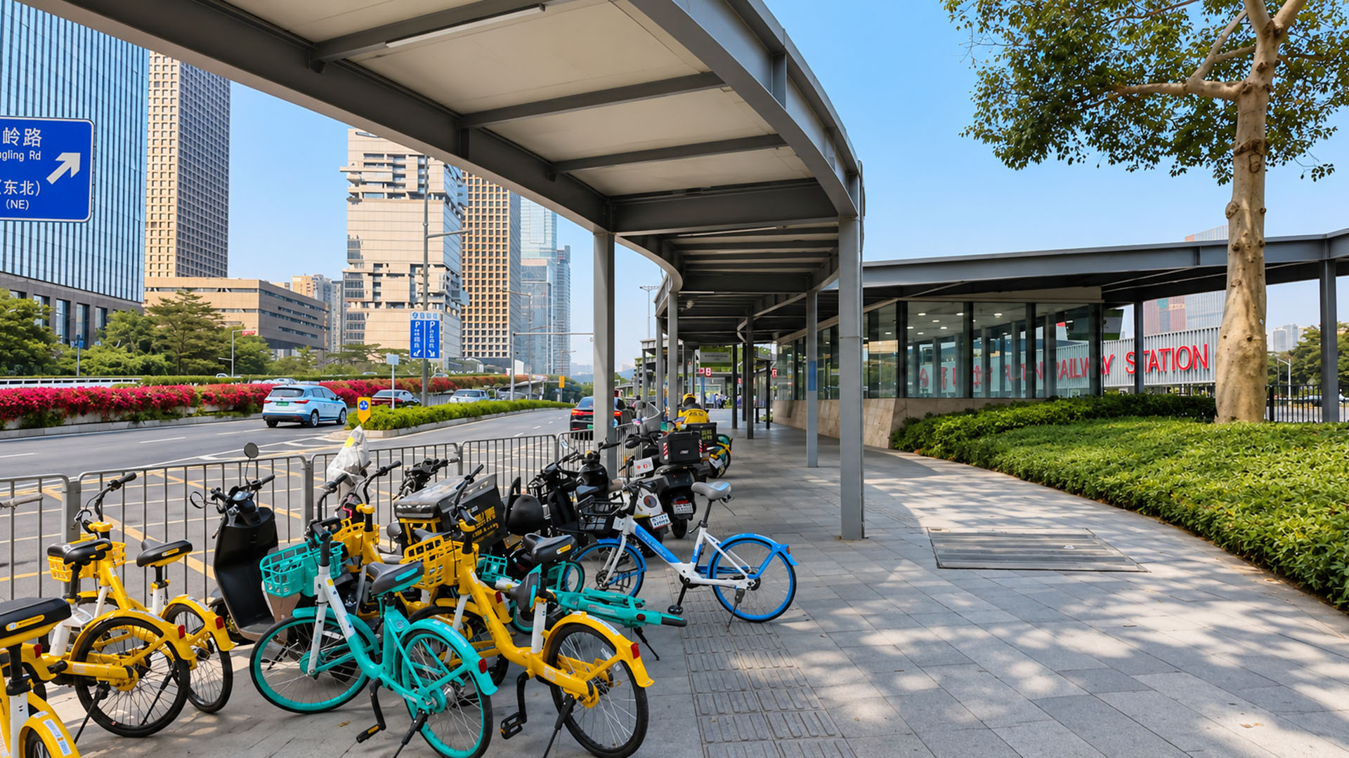 A shaded station entrance blends public transport with bike sharing