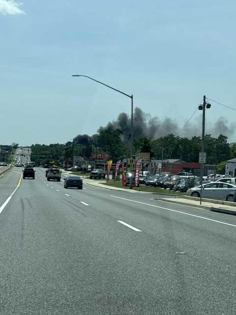 Thick black smoke billowed from Rosedale tire shop fire