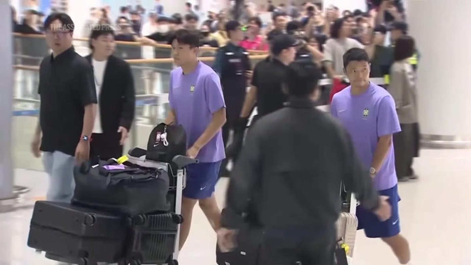 South Korean fans boo World Cup squad arriving home after early exit
