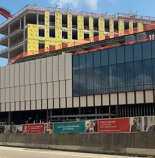 Record science hall may quietly lift Oakland home values