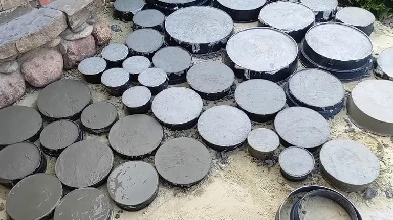 Use old plastic nursery pots to create budget-friendly pavers with a ...
