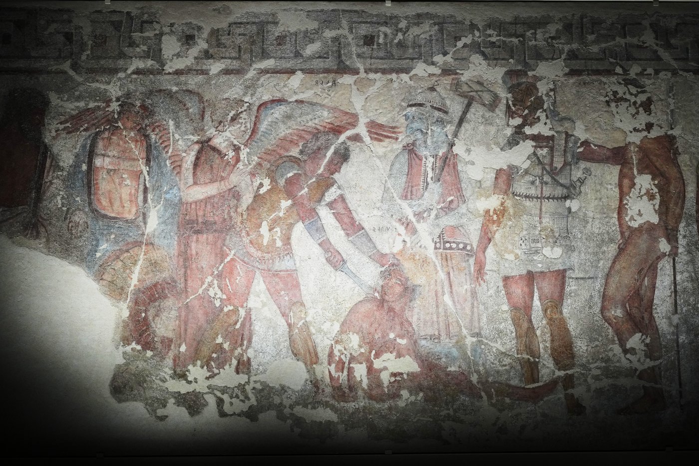 Italy displays paintings from an ancient Etruscan tomb, its latest ...