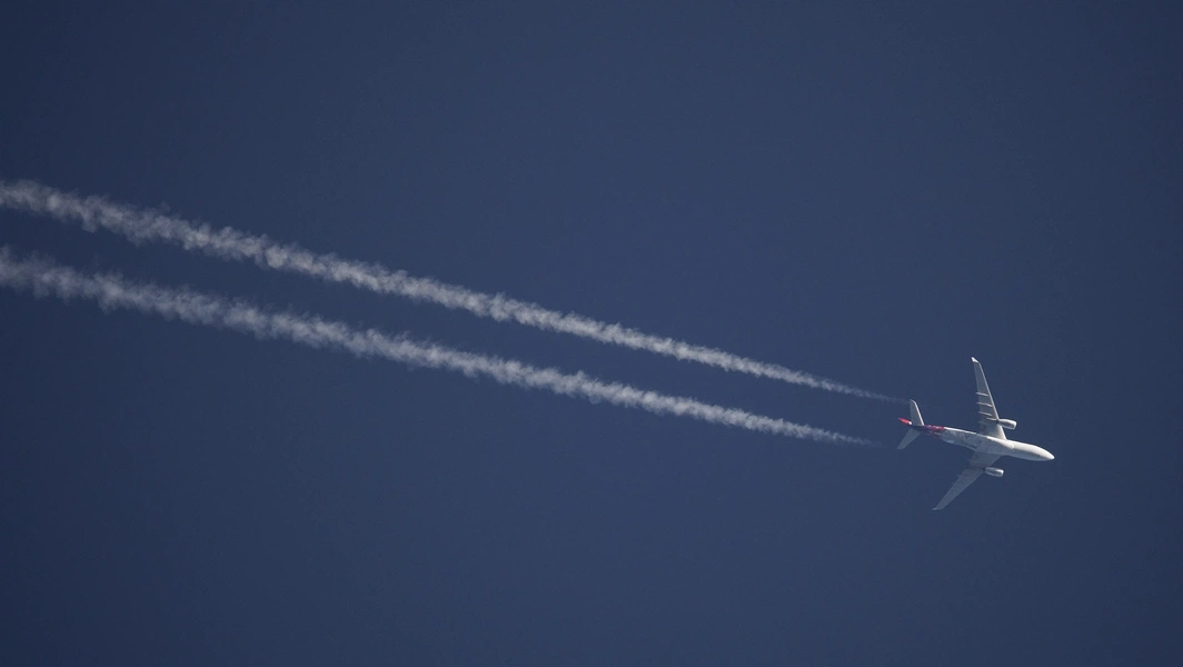 How jet contrails form and affect climate