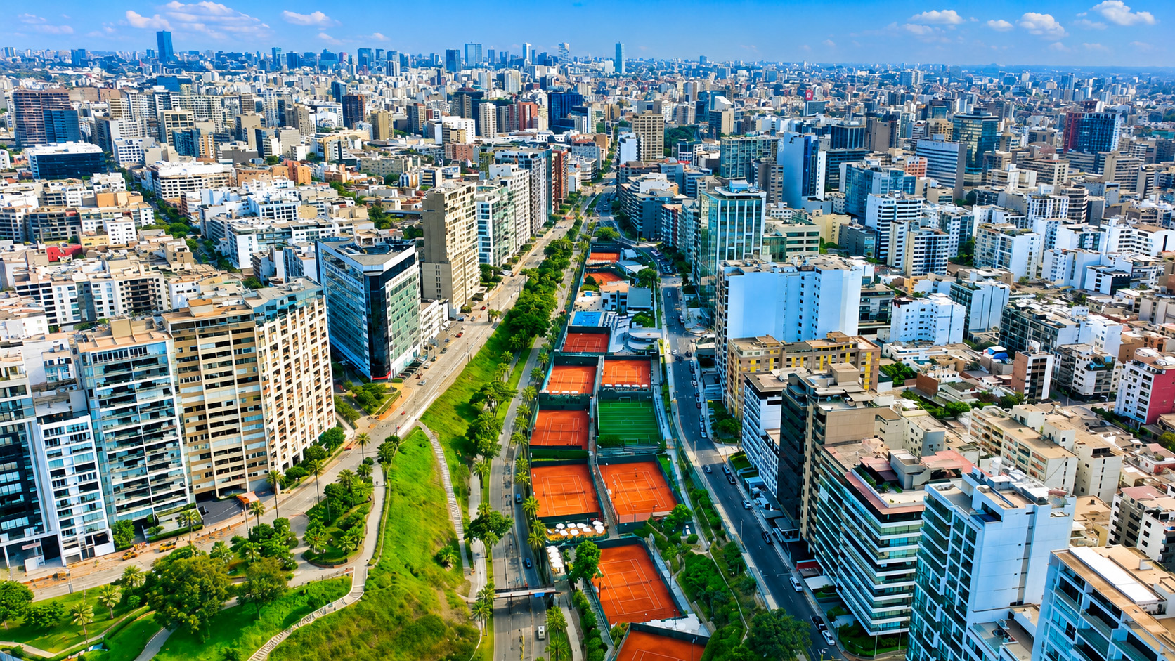 Lima’s modern skyline rising above green coastal districts