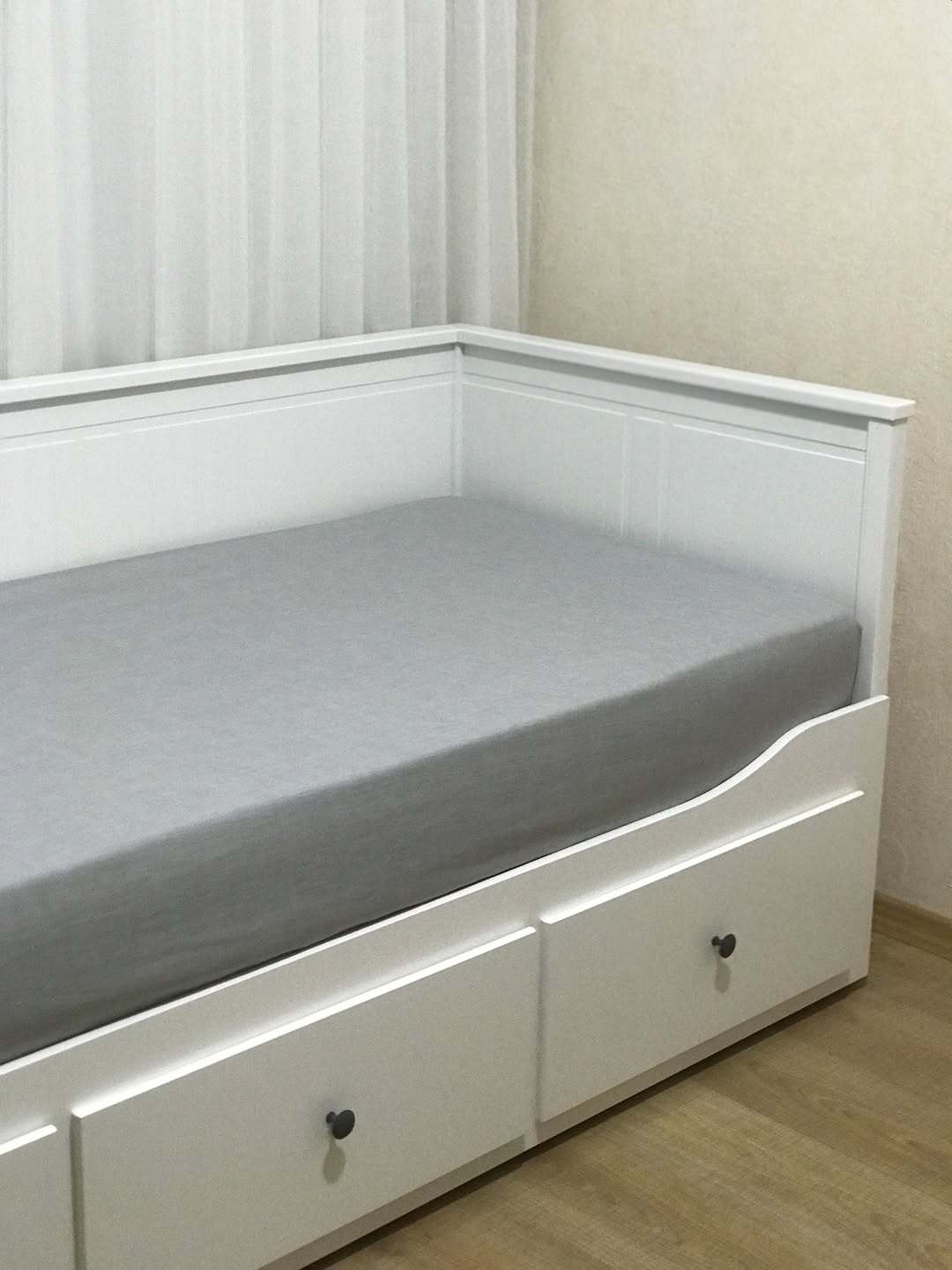 Turn a fitted sheet into a sofa cover