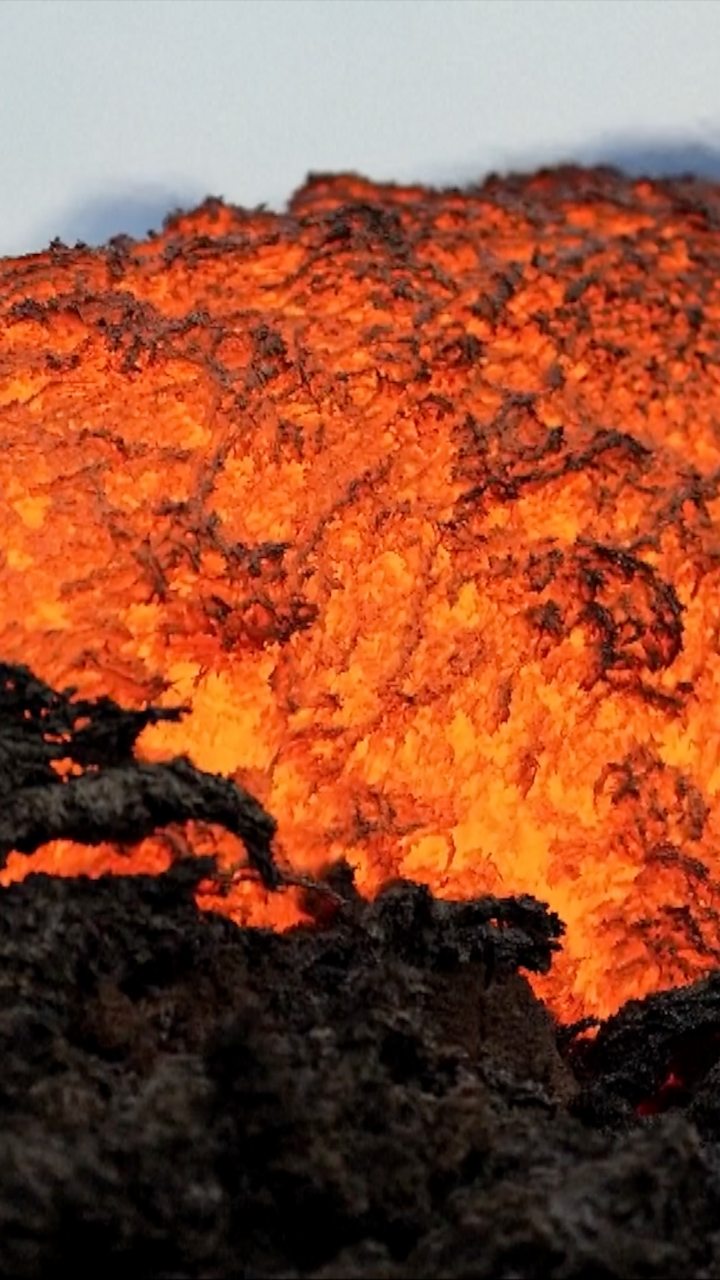 Watch: Mount Etna eruption creates flowing trial of bright orange lava