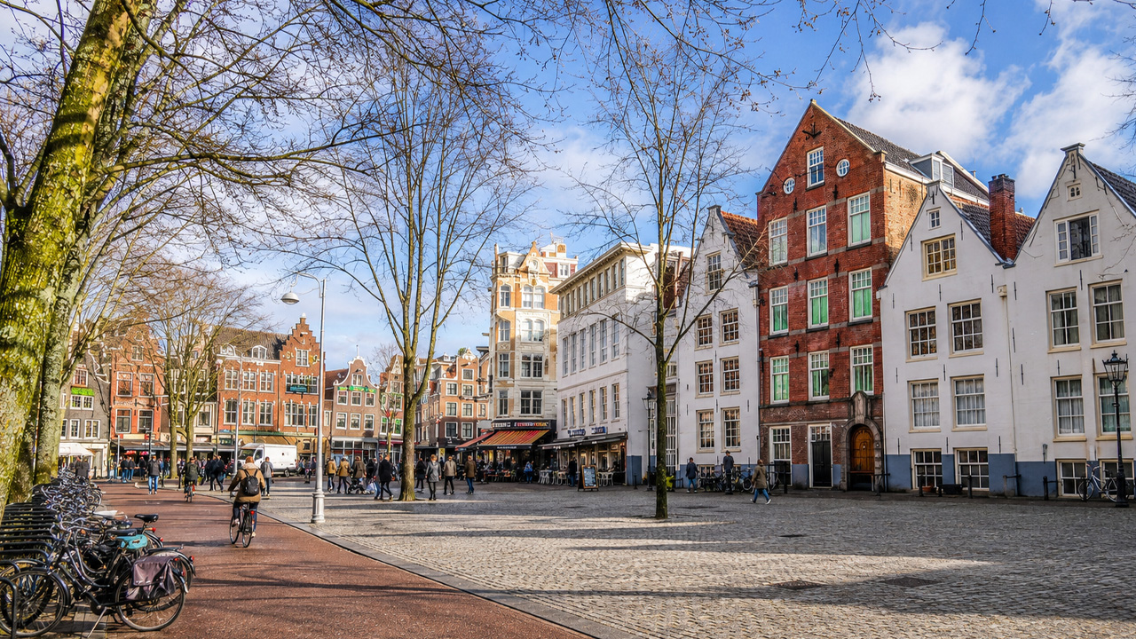 Why does this Amsterdam square feel so old world?
