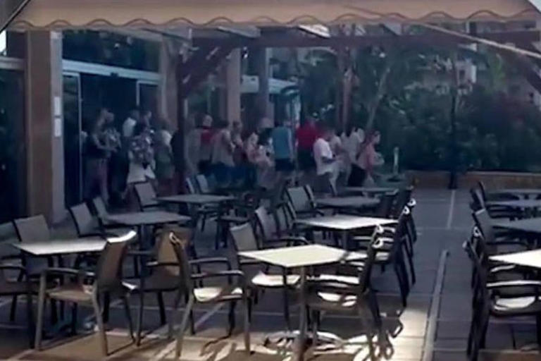 People pictured queueing for an hour to secure prime sunbeds at hotel ...