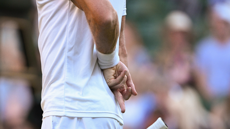 What do hand signals mean in Wimbledon doubles?
