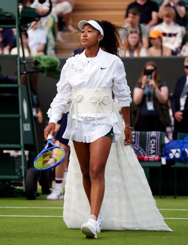 Naomi Osaka shows off new look as she breezes through Wimbledon second ...
