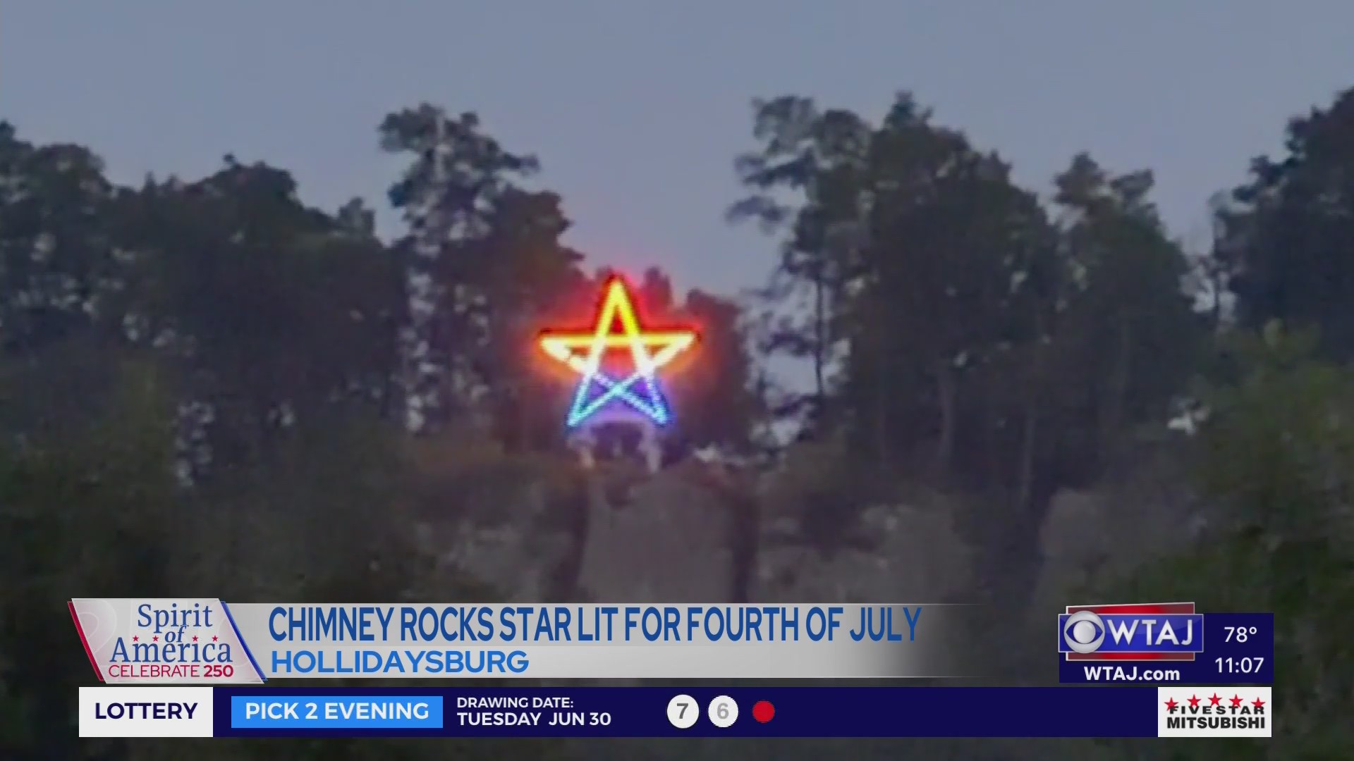 Chimney Rocks Star lit up before Fourth of July