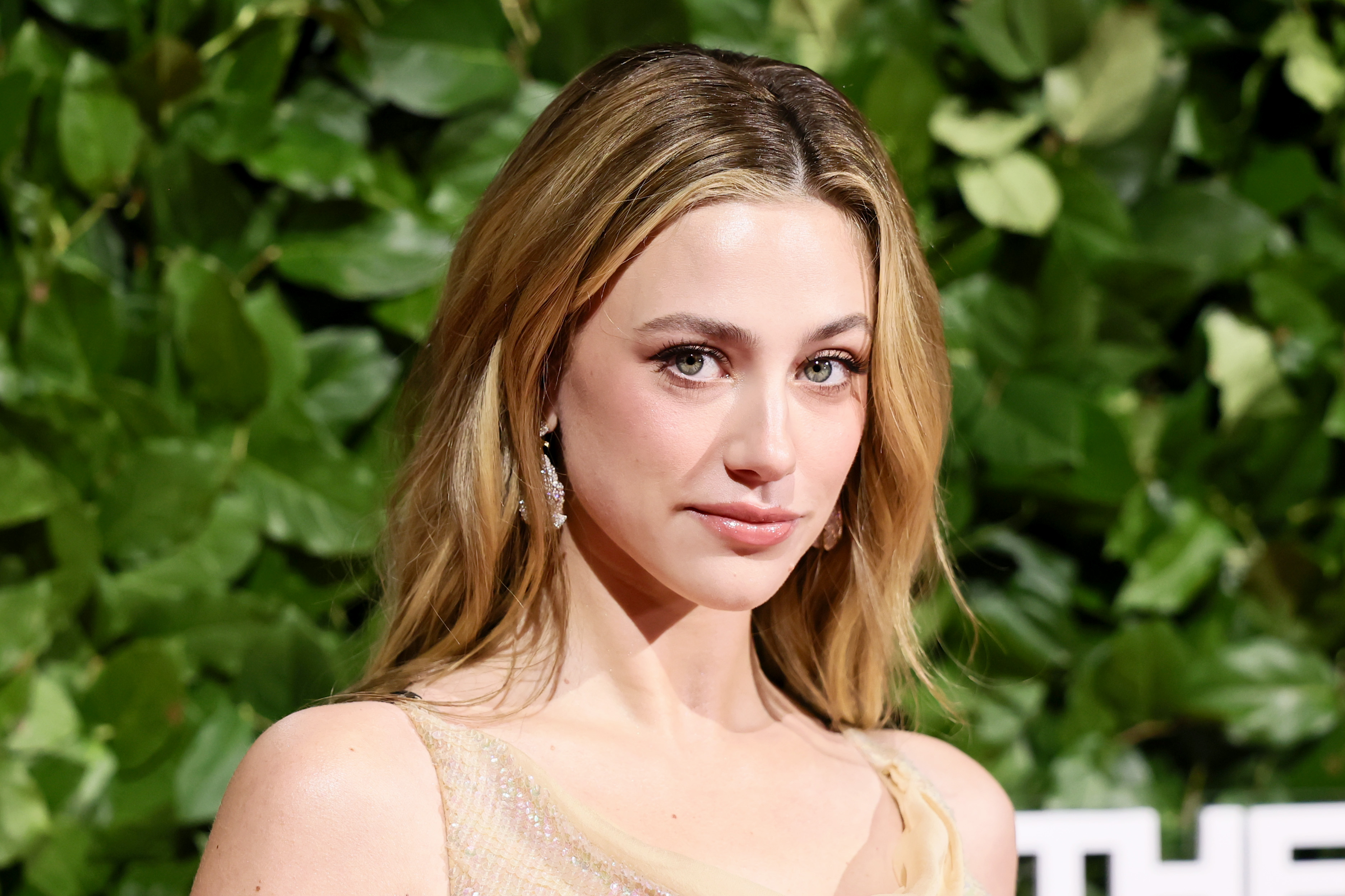 Lili Reinhart's pink Cult Gaia gown brings '90s glamour back to red ...