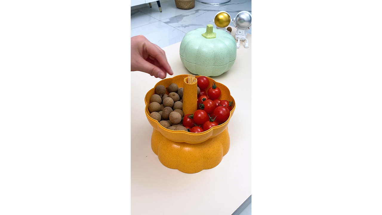 Storing snacks inside pumpkin shaped food container resulting in cute ...