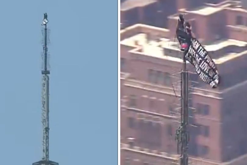Two people scale New York City's Empire State Building to fly flag with ...