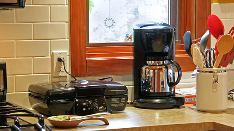 Make appliance cords less of an eyesore with one clever solution